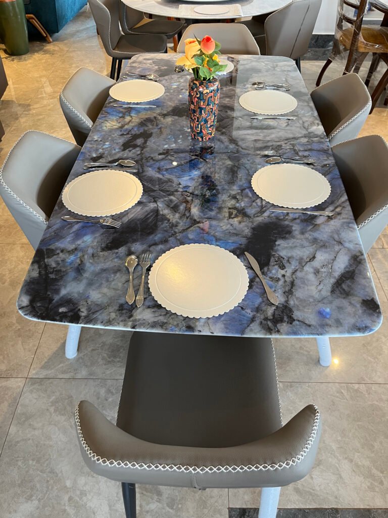 Dining Table with six seats and flower vessel - Comeagain Investments LTD